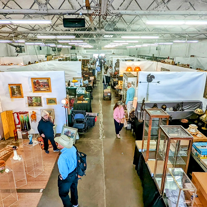 Booths stretch as far as the eye can see, creating narrow pathways that feel like you're navigating a maze designed by history itself.