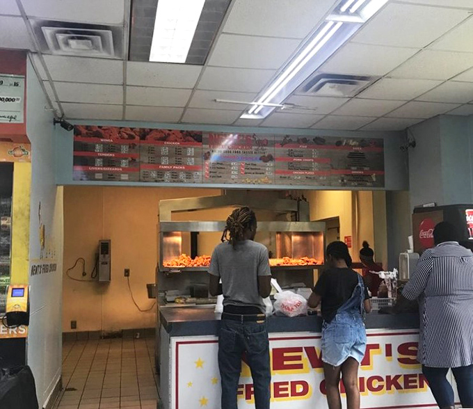 The lunch rush at Newt's - where patience is rewarded with crispy, golden perfection. Worth every minute in line.