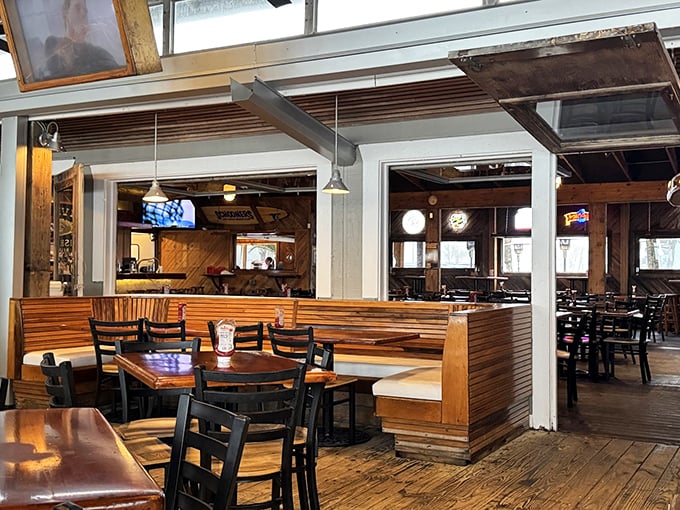 Wooden booths worn smooth by countless happy diners create that perfect blend of casual comfort and "I've discovered something special" atmosphere.