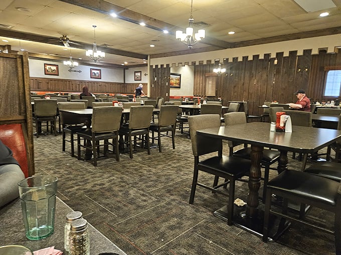 Classic comfort meets modern efficiency in this spacious dining room where every table promises a memorable meal.