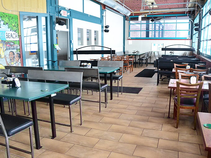 Simple tables and tiled floors say "we're about the pizza, not the frills." The kind of place where memories are made between bites.
