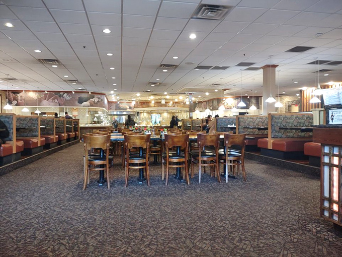 Comfortable booths and thoughtful spacing create the perfect backdrop for the impending food marathon. Your strategy planning begins now.