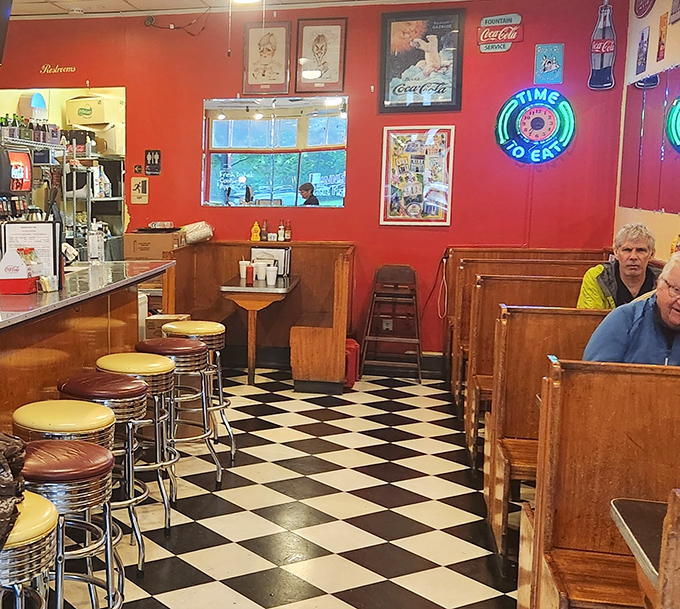 Step inside and the checkerboard floor announces you've entered the diner dimension, where neon signs glow and vinyl booths await your stories.