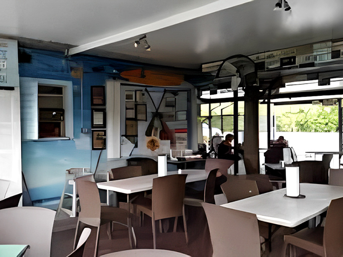 Simple tables, blue walls, and zero pretension – Alabama Jack's interior is where memories are made, not Instagram posts staged.