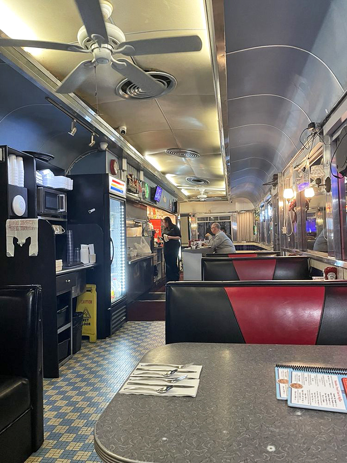Step inside and the nostalgia hits harder than your first cup of morning coffee. Those red and black booths have heard decades of stories.