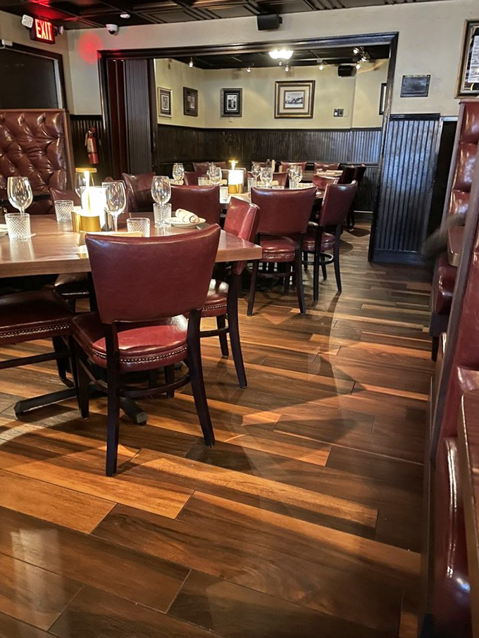 Red leather booths and warm wood paneling &ndash; not because they're trendy, but because they never stopped being perfect for serious steak enjoyment.