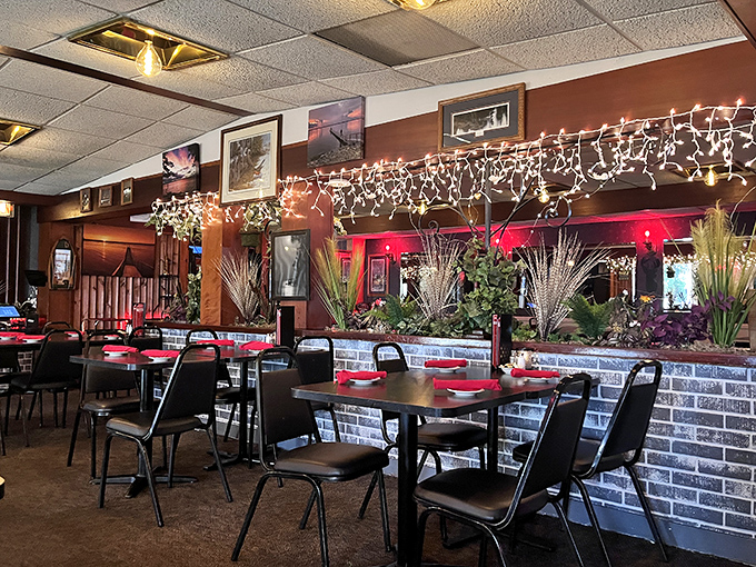 String lights twinkle above brick dividers and red tablecloths, creating that magical supper club ambiance where memories are made and calories don't count.