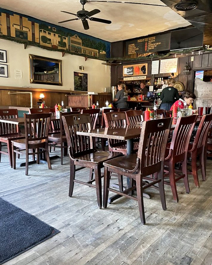 Inside, worn wooden floors and classic chairs tell stories of decades of satisfied diners. This isn't trendy d&eacute;cor; it's authentic Cincinnati history served alongside your burger.
