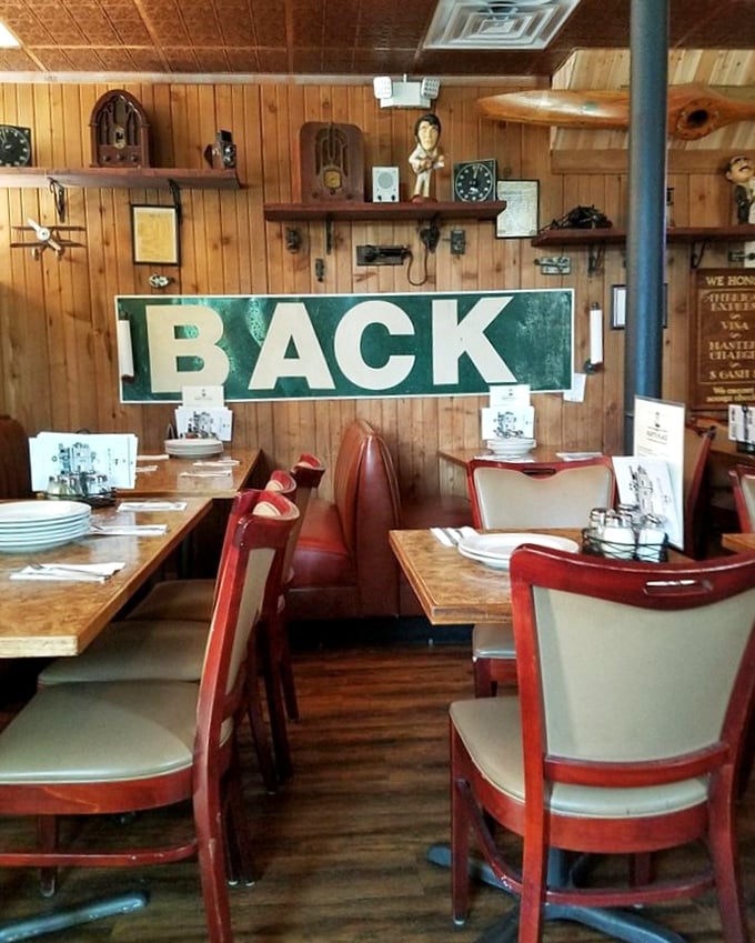Time travel isn't possible yet, but walking into this wood-paneled sanctuary with vintage collectibles comes pretty close. That "BACK" sign tells a story of resilience.