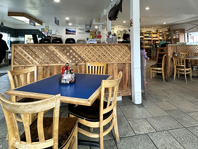 Those wooden dividers have witnessed more happy seafood moments than a pelican at a fishing pier.