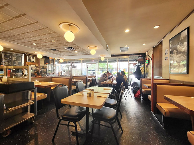 Inside Lou Mitchell's, time stands still. The classic diner setup has witnessed countless first dates, business deals, and "I can't believe I ate the whole thing" moments.