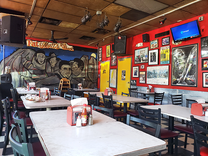 Inside, vibrant walls showcase blues legends while simple tables promise one thing: your focus belongs entirely on what's about to land on that plate.