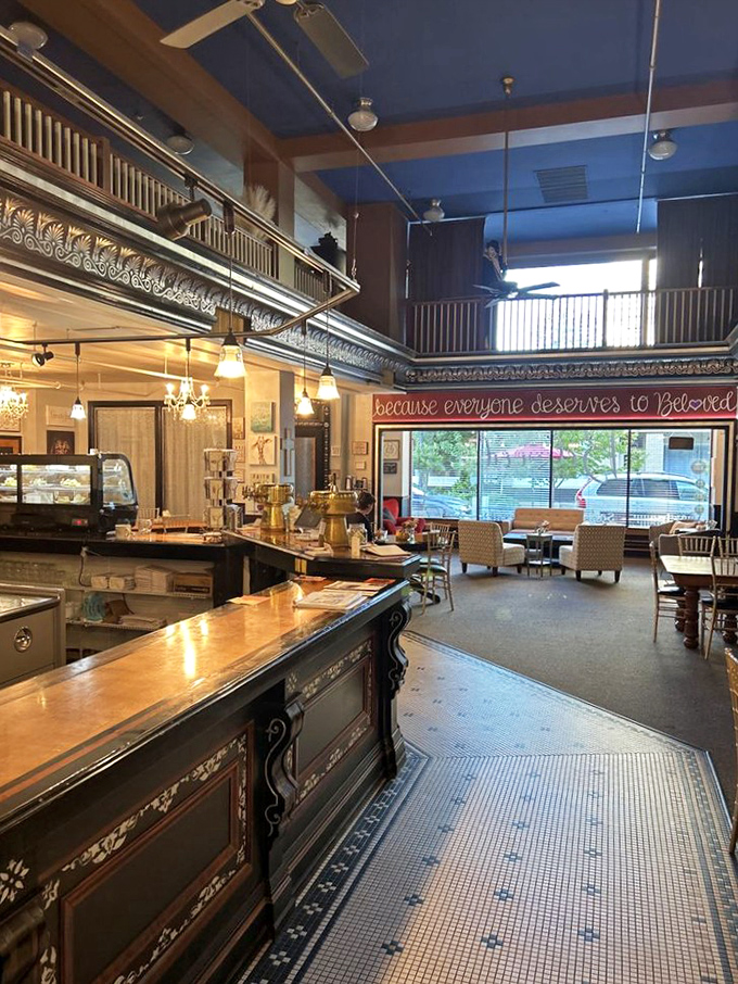 Step inside and the blue ceiling soars above ornate woodwork, creating a space that feels like dessert's answer to the Sistine Chapel.