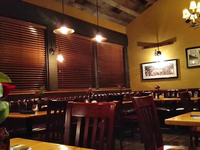 Warm wood tones, cozy booths, and just the right lighting create that rare atmosphere where both first dates and family reunions feel equally at home.