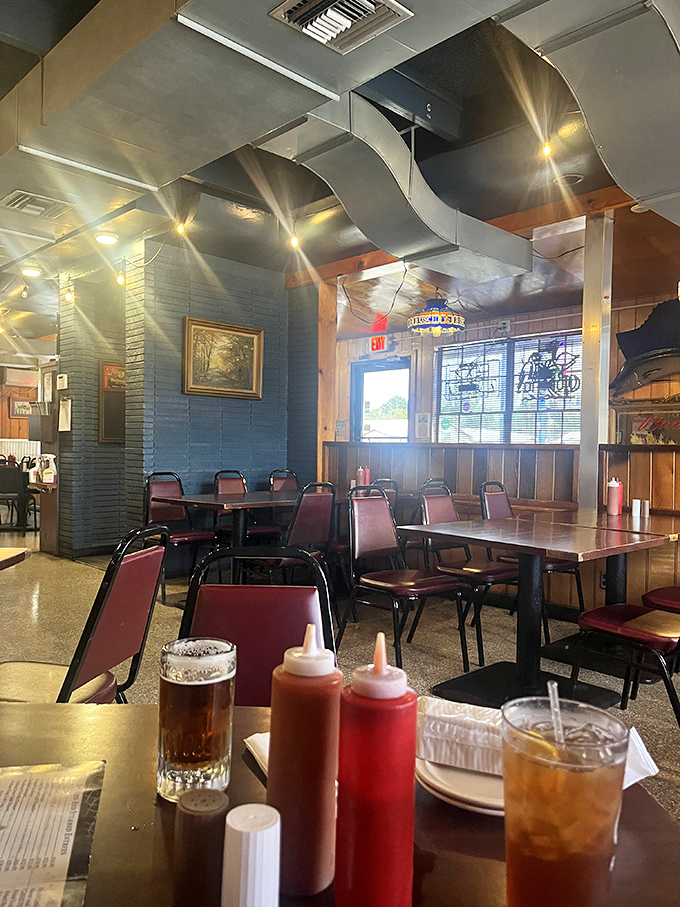 No-nonsense dining at its finest. Those burgundy chairs have cradled seafood lovers for generations, while condiment bottles stand ready for action.