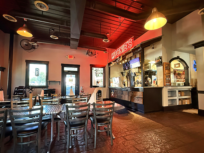 Red neon casts a warm glow over brick floors and metal chairs &ndash; no pretension, just the promise of meat-centric bliss ahead.