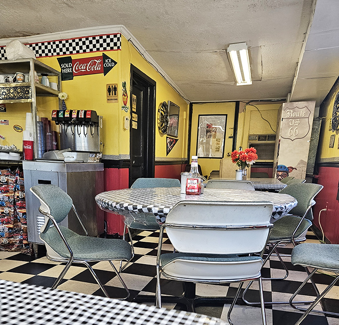 Step into a time machine! The classic diner aesthetic with checkered floors and Route 66 memorabilia creates the perfect backdrop for comfort food conversations.