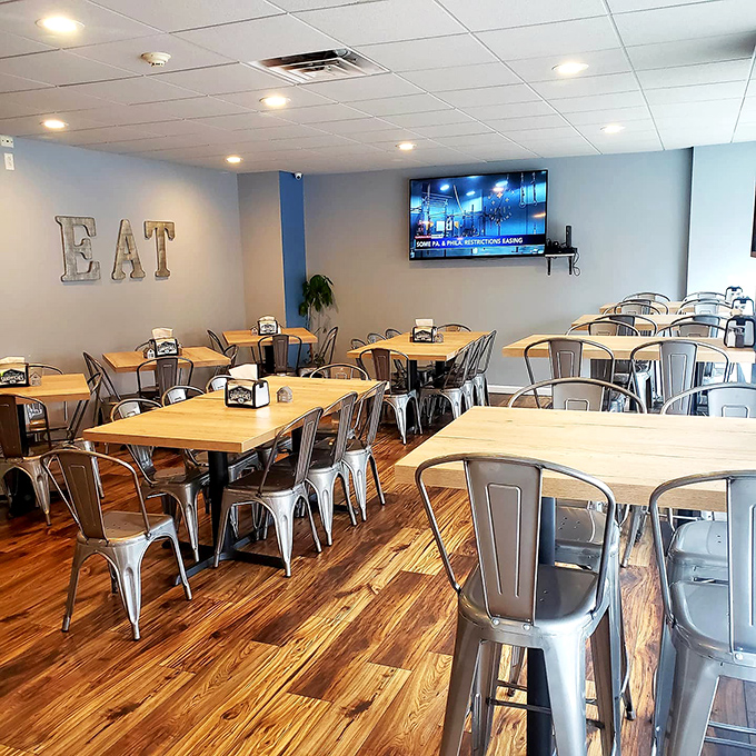 Clean lines, wooden tables, and that metal "EAT" sign on the wall &ndash; as if you needed any encouragement once those aromas hit your nostrils.