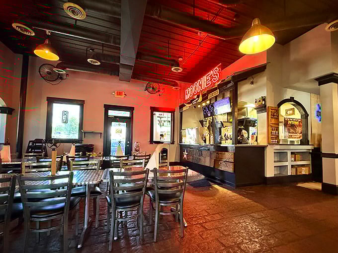 Red neon bathes the dining room in a warm glow, creating that perfect "you've arrived somewhere special" atmosphere that great barbecue deserves.