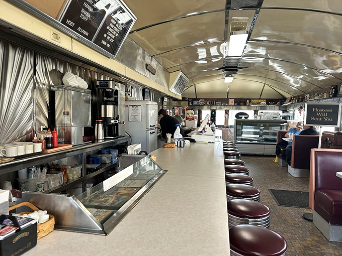 Classic Americana in its purest form: gleaming stainless steel, burgundy stools, and a counter where strangers become friends over coffee refills.