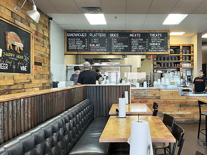 Rustic wood, corrugated metal, and that chalkboard menu&mdash;this isn't just decor, it's a barbecue manifesto. Simple surroundings let the meat be the star.