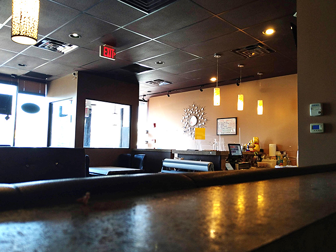 Simple, clean, and focused on what matters—the interior says "We're not here to dazzle you with décor, but with what comes out of our kitchen."