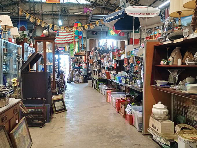 Colorful pennants and American flags create a perpetual celebration atmosphere inside, where every aisle promises unexpected discoveries.