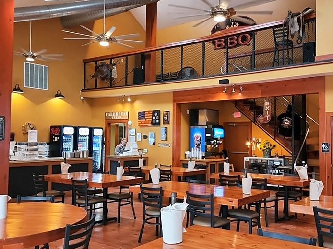 High ceilings, warm wood tones, and that balcony emblazoned with "BBQ"&mdash;this isn't just a restaurant, it's a cathedral of carnivorous delights.