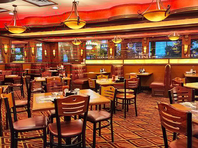 Warm wood paneling, plush booths, and amber lighting create the perfect backdrop for life's important questions&mdash;like "Should I order dessert?" (The answer is always yes.)