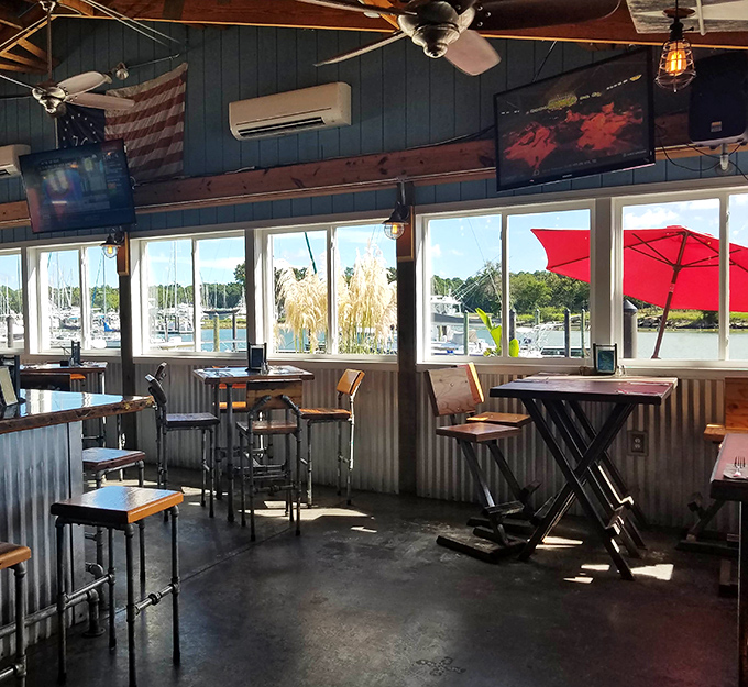 Inside, corrugated metal walls meet panoramic harbor views, creating that perfect "I've discovered something special" atmosphere that vacation memories are made of.