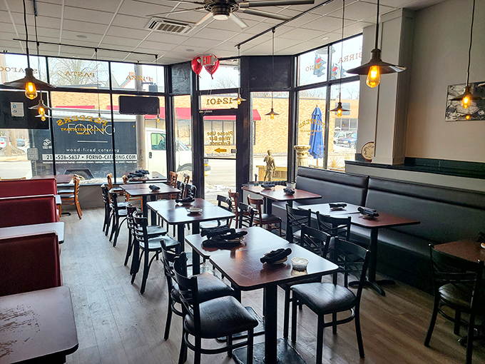 Simple wooden tables, comfortable chairs, and natural light create the perfect canvas for what really matters: the food and the company.