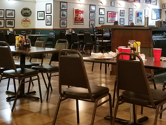Classic checkered floors and walls adorned with local memorabilia create that perfect small-town ambiance where conversations flow as freely as the coffee.