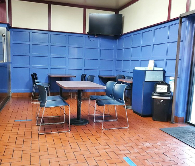 The no-nonsense blue interior says it all: we're here for the food, not the ambiance. Like a British pub without the sticky floors.