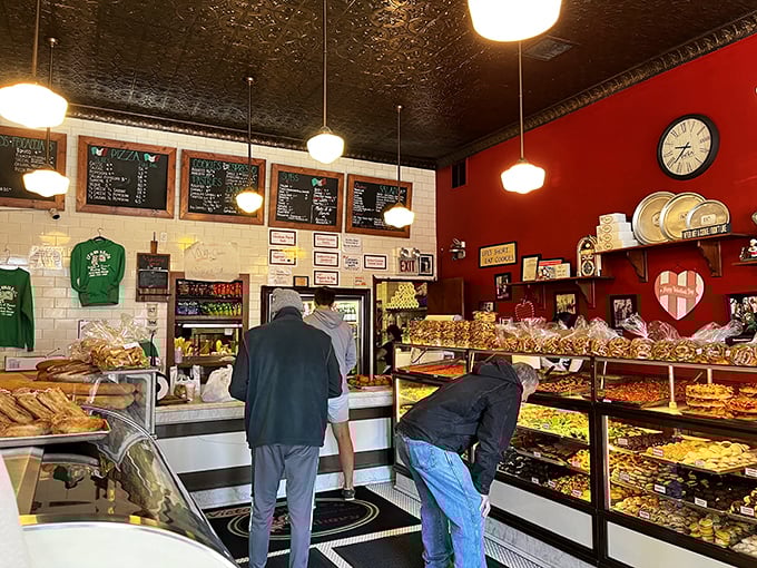 The bakery's interior is a time capsule of Italian-American culture. Customers lean in to make their selections while vintage fixtures transport you to simpler times.
