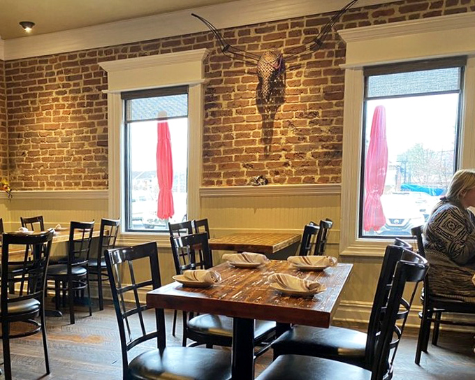 Exposed brick walls and rustic wooden tables create that perfect "I've discovered something special" atmosphere that makes every bite taste even better.