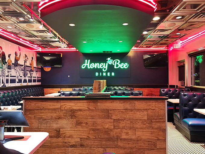 Step inside where neon dreams meet comfort food reality in this gleaming temple of diner perfection.