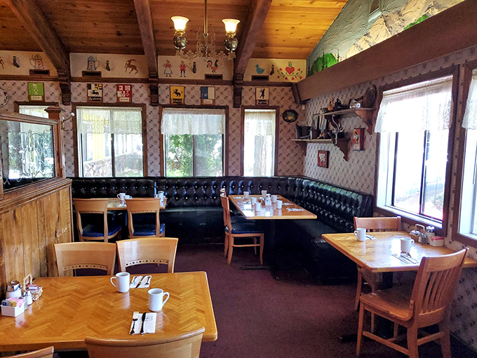Step inside and you're transported to an Alpine wonderland, where wooden beams, cozy booths, and charming decor create the perfect breakfast sanctuary.