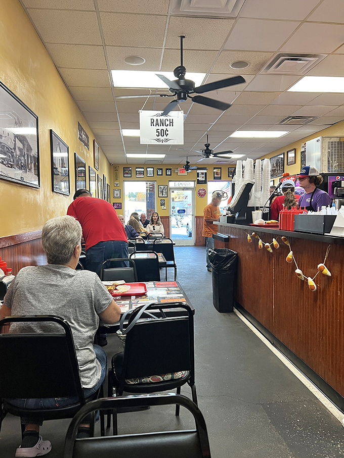 Step inside where ceiling fans spin lazy circles above conversations that have lasted decades.