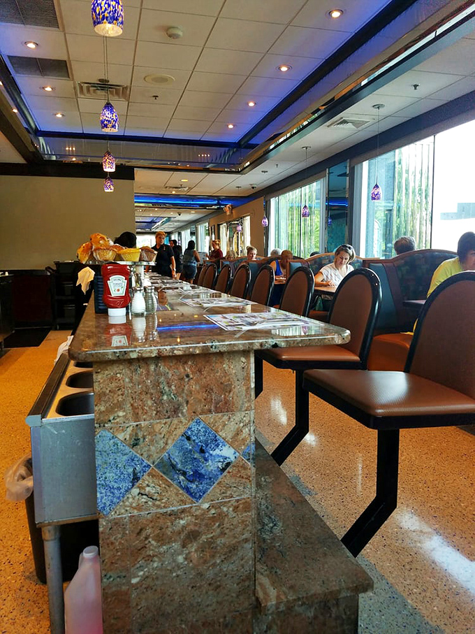 Inside, granite countertops and colorful pendant lighting create an unexpected elegance that says, "This isn't your grandfather's greasy spoon."