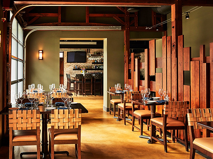 Warm wooden textures and thoughtful design create an atmosphere where comfort meets elegance&mdash;exactly where you want to linger over that second glass of wine.