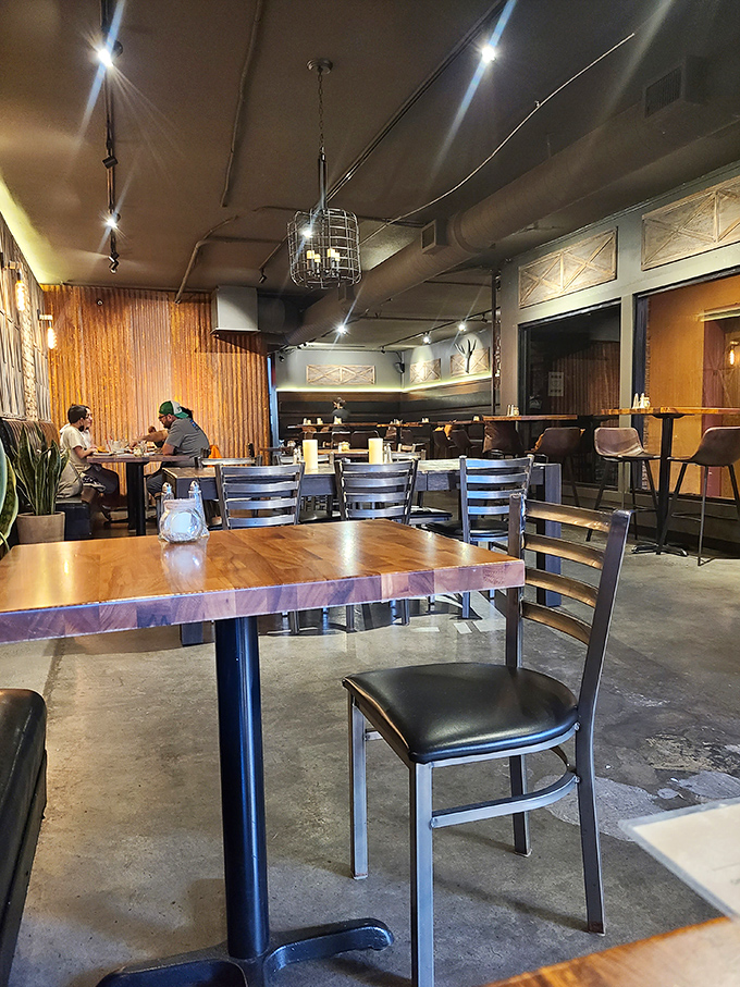 Industrial-chic meets barbecue comfort inside Steve's, where wood paneling and exposed ductwork create the perfect backdrop for meat-induced euphoria.
