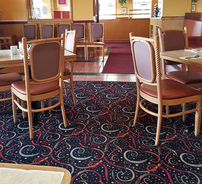 The interior strikes that perfect diner balance: comfortable enough to linger, classic enough to make you nostalgic for breakfasts before smartphones existed.