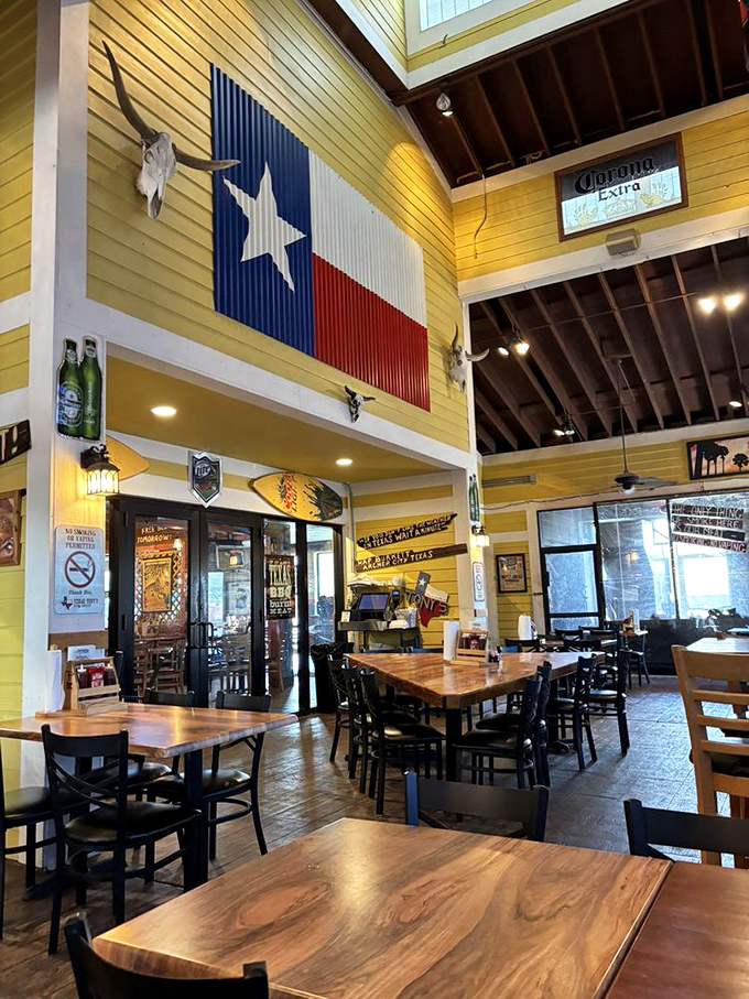 Inside, the soaring ceiling showcases a massive Texas flag and cattle skulls—proof that Florida knows how to channel Lone Star spirit.