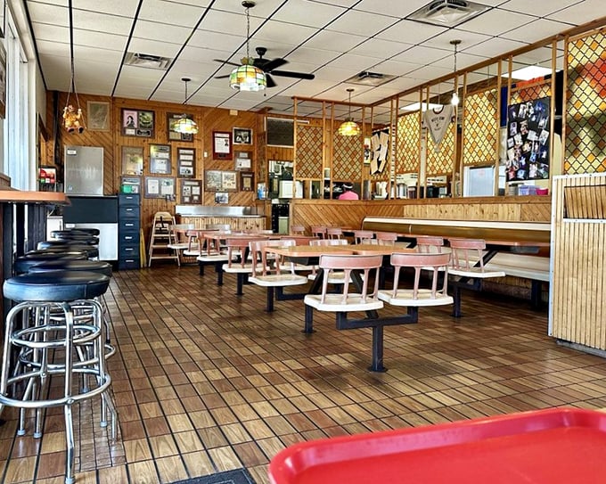 Step inside and time travel to a simpler era&mdash;wood paneling, fixed swivel seats, and memorabilia that tells the story of Orlando's beloved beef sanctuary.