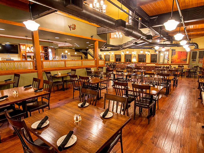 Spacious dining room with warm wood tones creates the perfect atmosphere for leisurely seafood feasts.