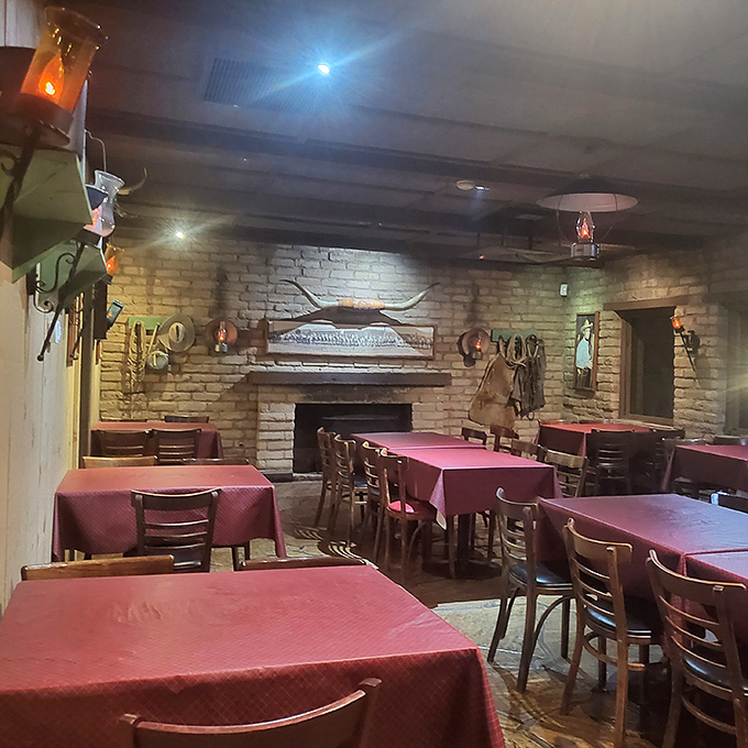 Stone walls and burgundy tablecloths create the perfect backdrop for life-changing carnivorous decisions. Somewhere, a vegetarian just felt a chill.