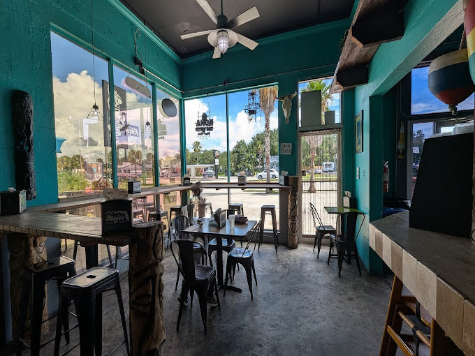 Step inside to a turquoise paradise where industrial-chic meets coastal cool&mdash;the perfect backdrop for your taco adventure.