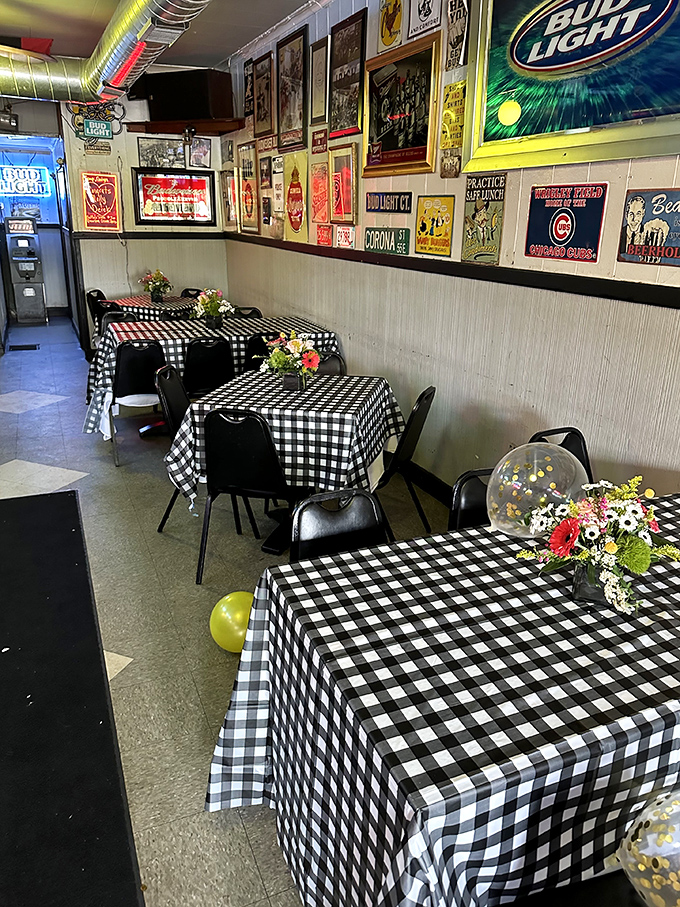 Classic black and white checkered tablecloths set against walls adorned with vintage memorabilia &ndash; dining here feels like a warm hug from your favorite aunt.