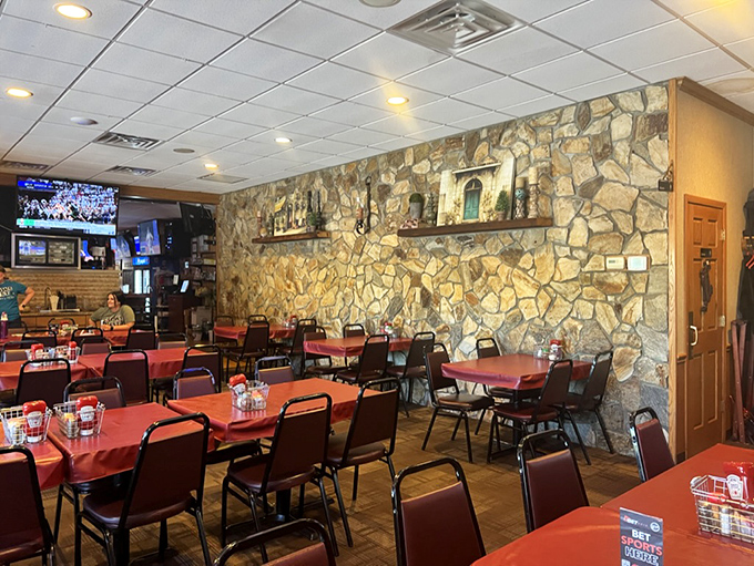 Stone walls and red tablecloths create that perfect "somebody's Italian grandmother is about to feed you until you can't move" atmosphere.