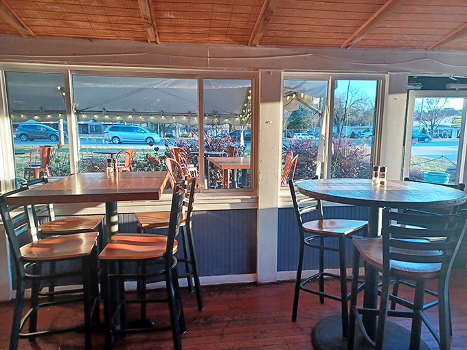 Sunlight streams through windows illuminating wooden tables where countless seafood feasts have unfolded. The stage is set for yours.